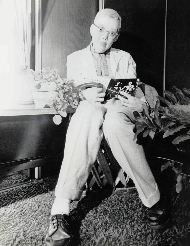 Booji Boy Holding DEVO's First 7-inch Vinyl Single - BIRDY MAGAZINE